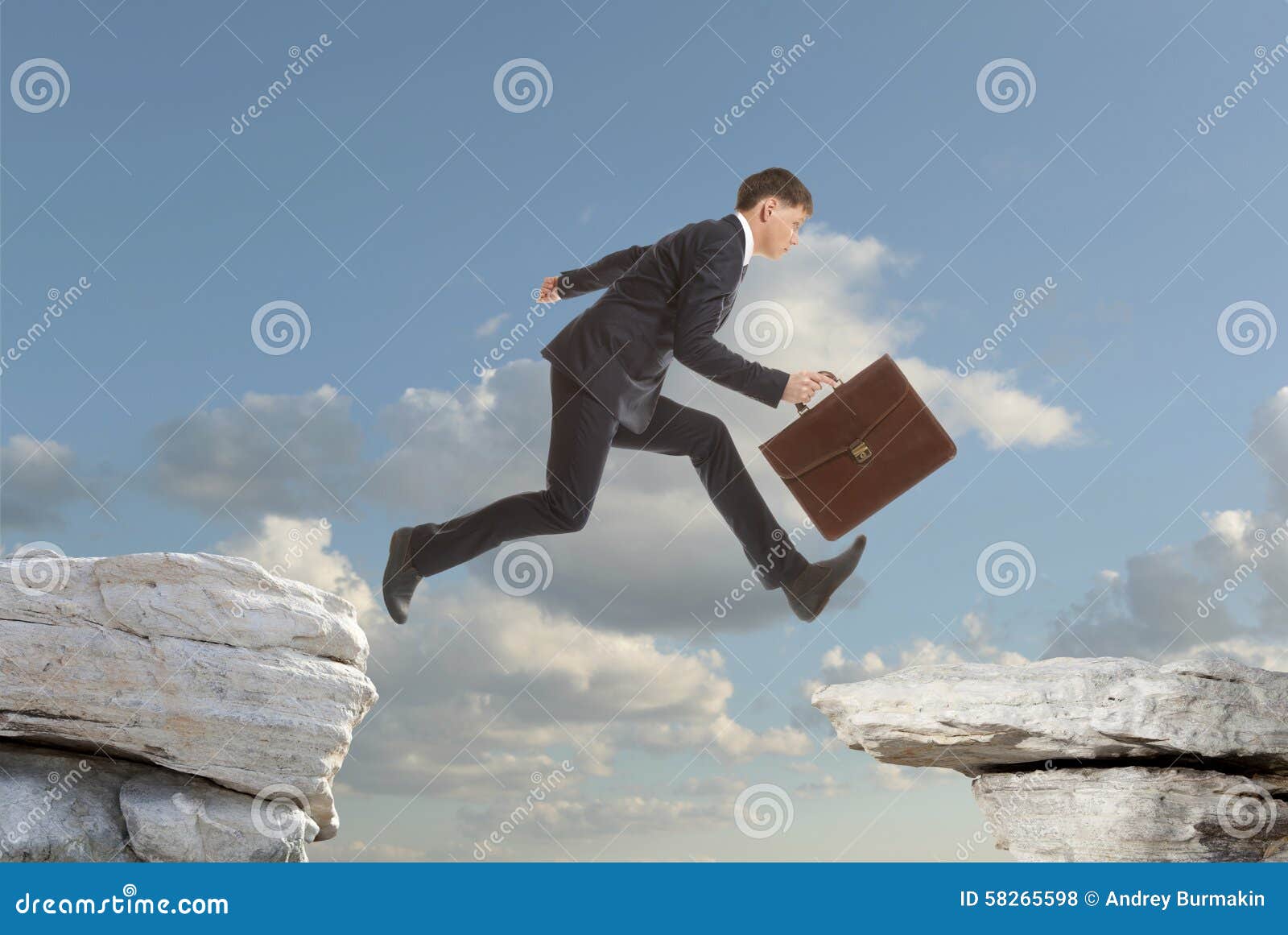 Businessman Jumping Over Rocks Stock Photo - Image of bridge, career ...