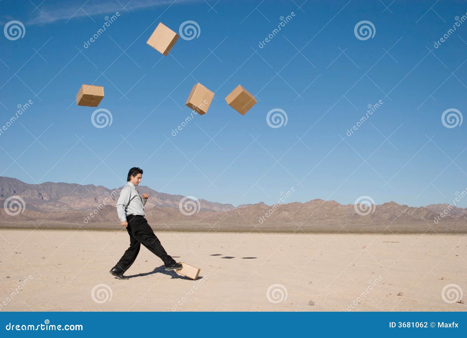 Businessman kicking boxes stock photo. Image of handsome - 3681062