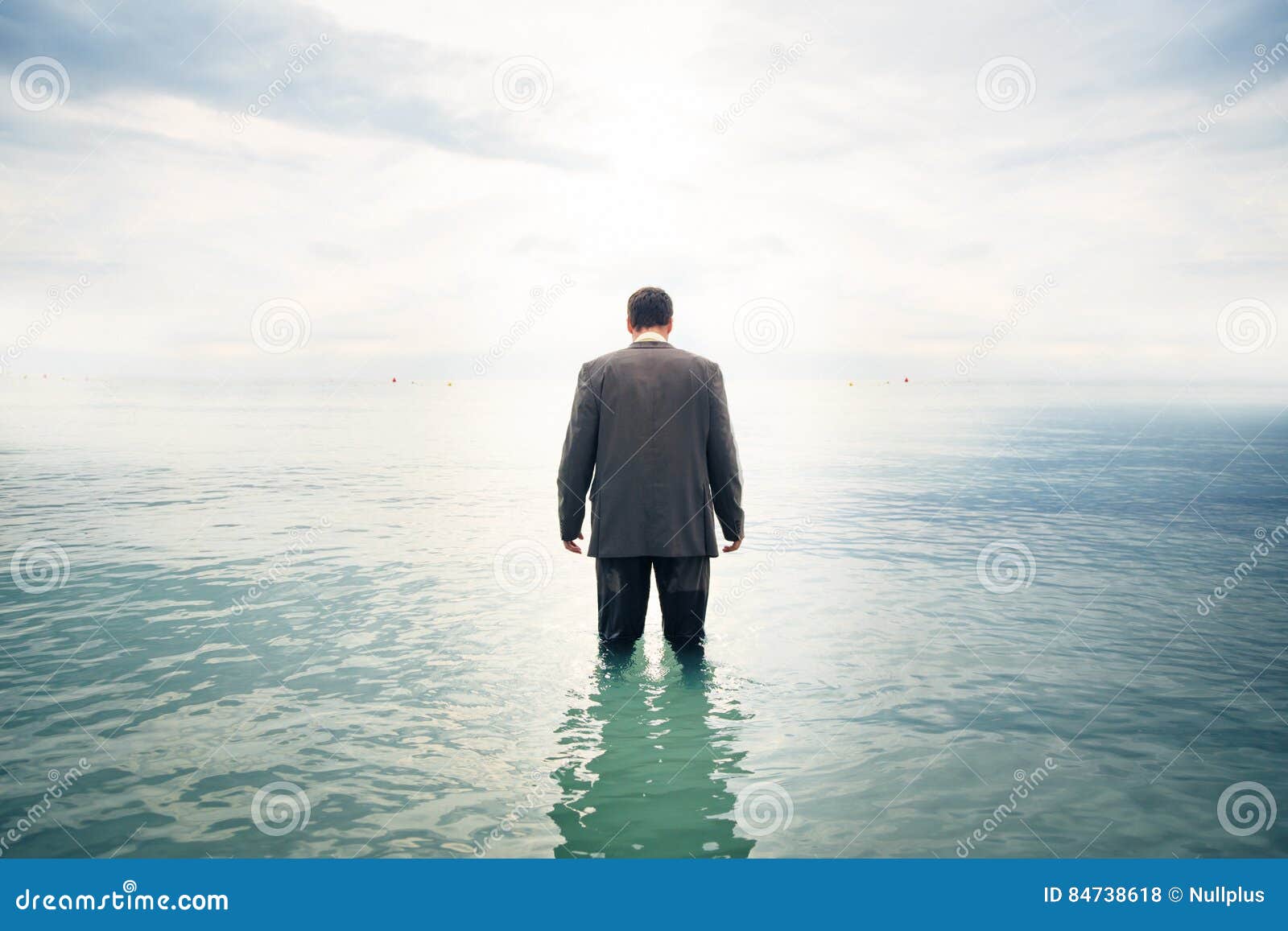 Businessman Knee-deep in Water Stock Photo - Image of scenics, vacation ...