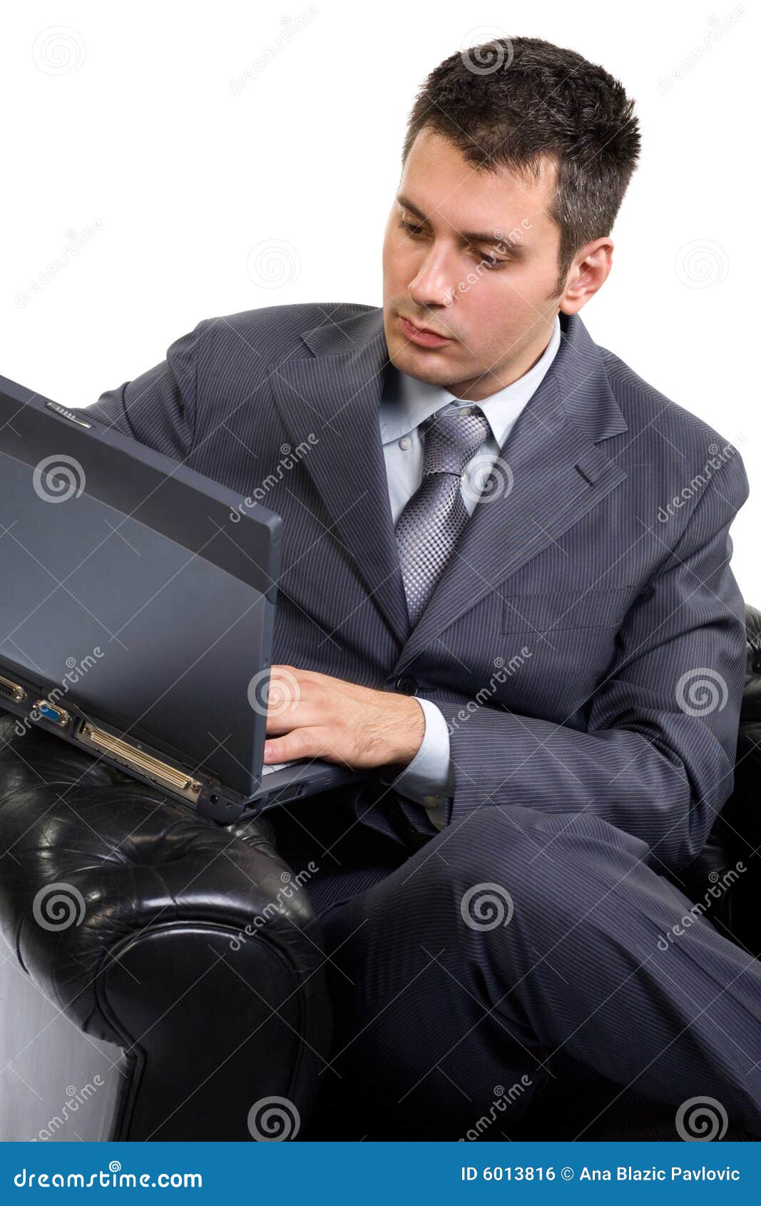 Businessman with a laptop stock photo. Image of laptop - 6013816
