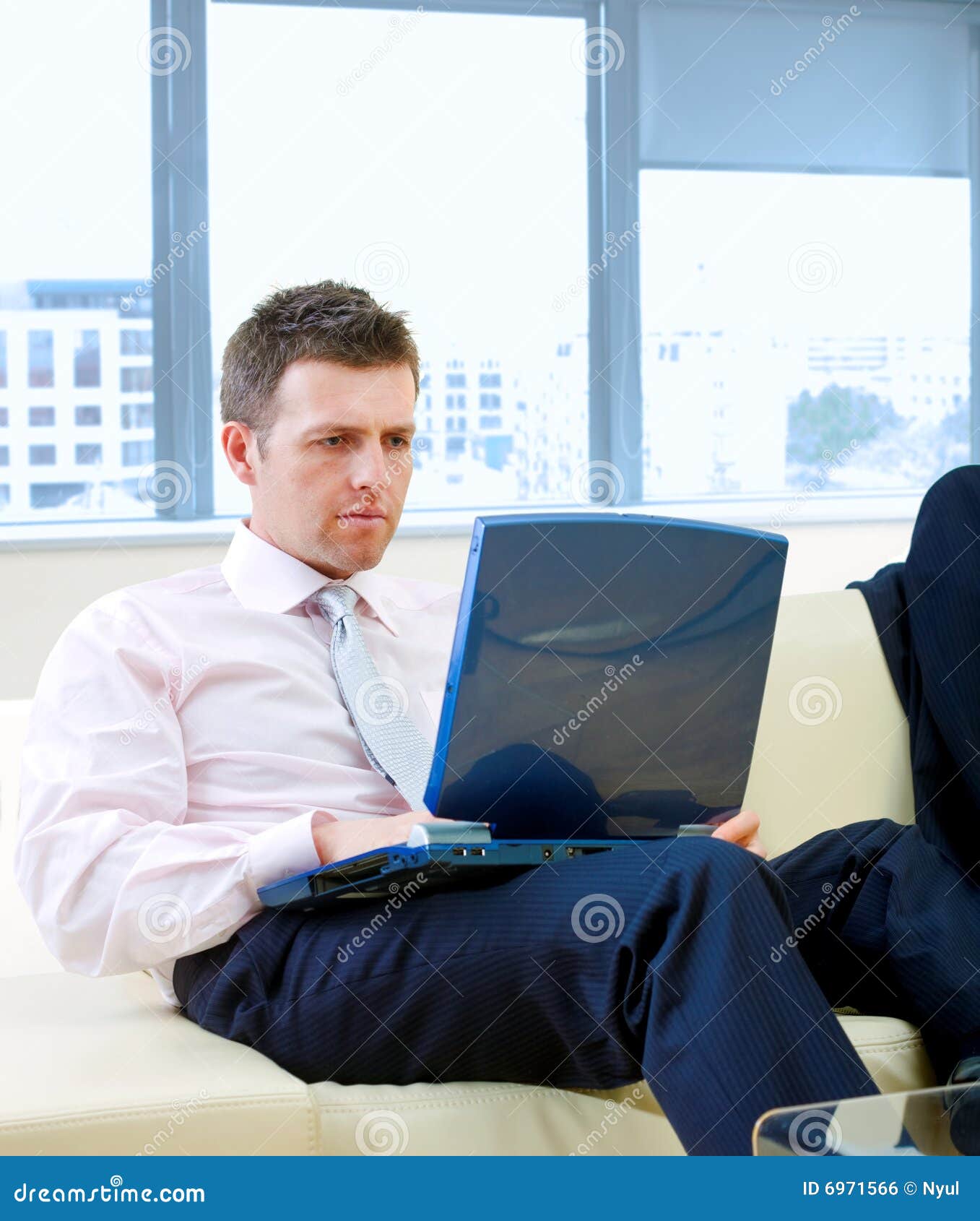 Businessman with laptop stock photo. Image of career, businessperson ...