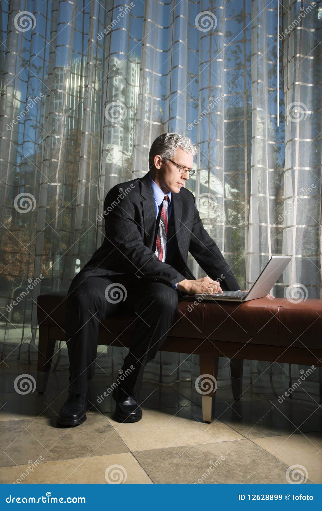 Businessman with Laptop Computer. Stock Image - Image of indoors, male ...