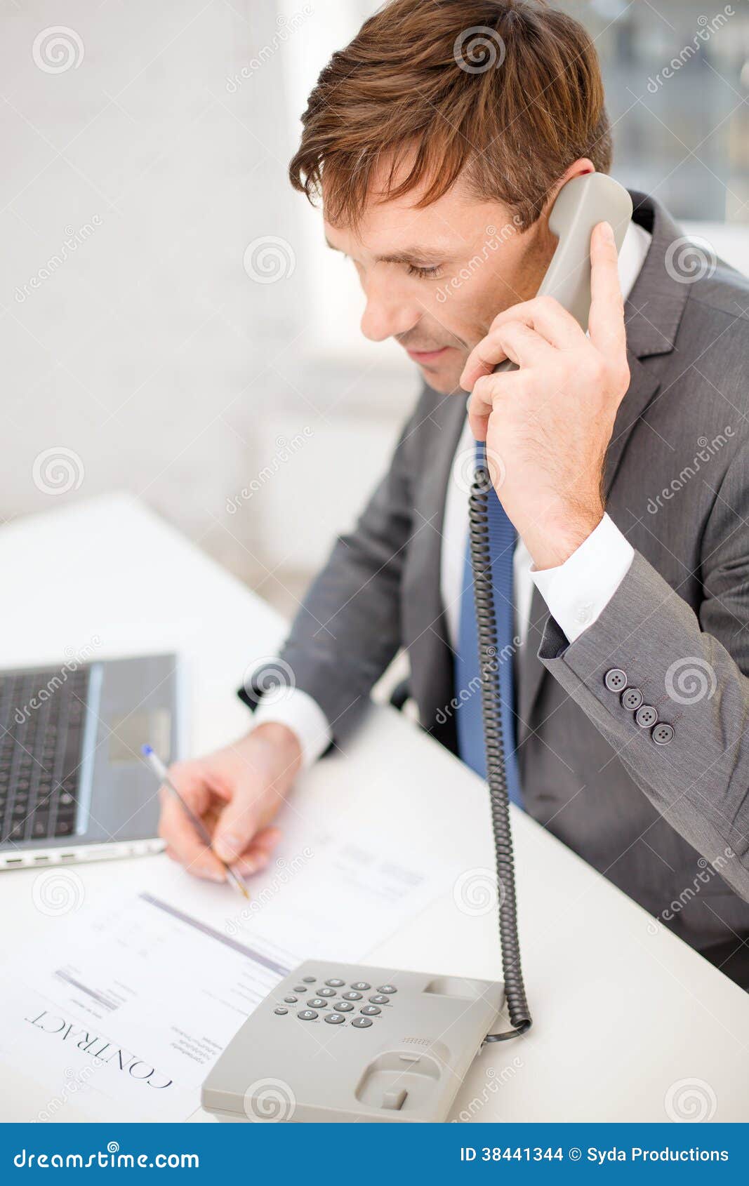 Businessman with Laptop Computer and Phone Stock Photo - Image of ...