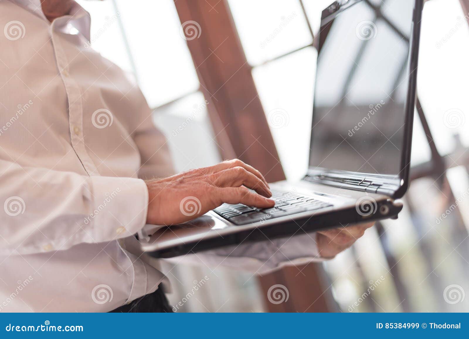 Businessman with Laptop, Light Effect Stock Image - Image of indoors ...