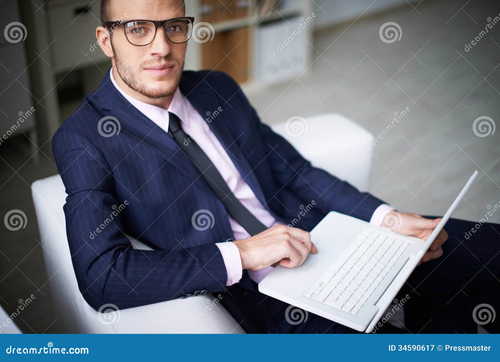 Businessman with laptop stock image. Image of business - 34590617