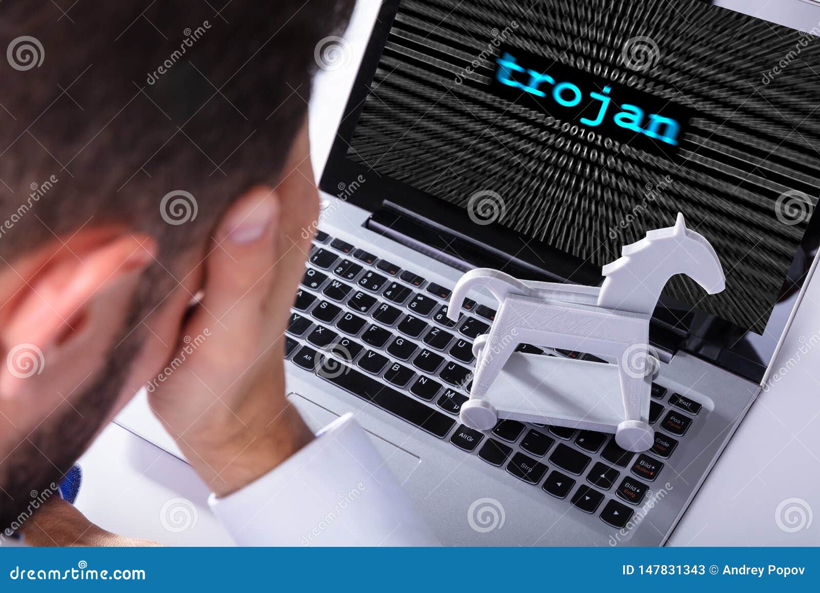 Businessman with Laptop Screen Showing Trojan Text Stock Image - Image ...