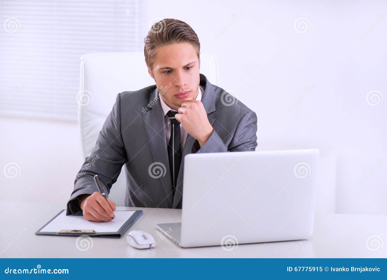 Businessman with laptop stock image. Image of contemporary - 67775915