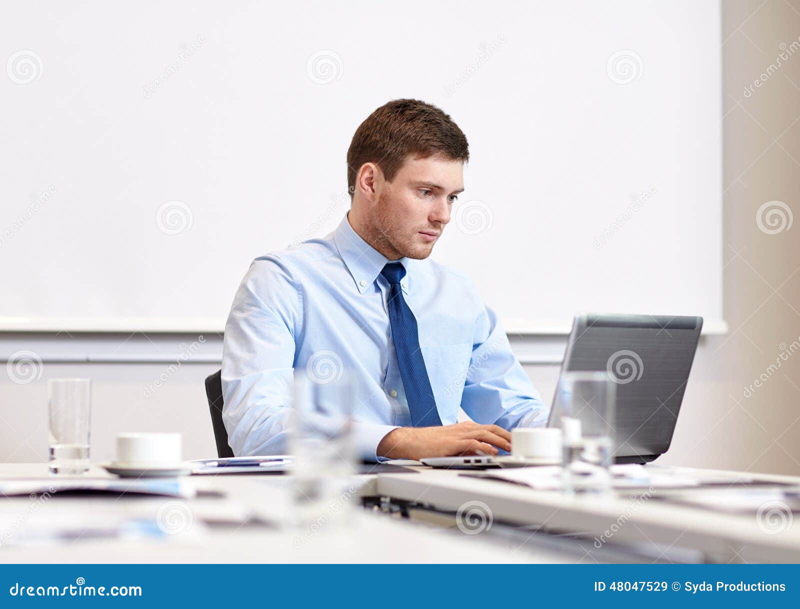 Businessman with Laptop Working in Office Stock Image - Image of ...