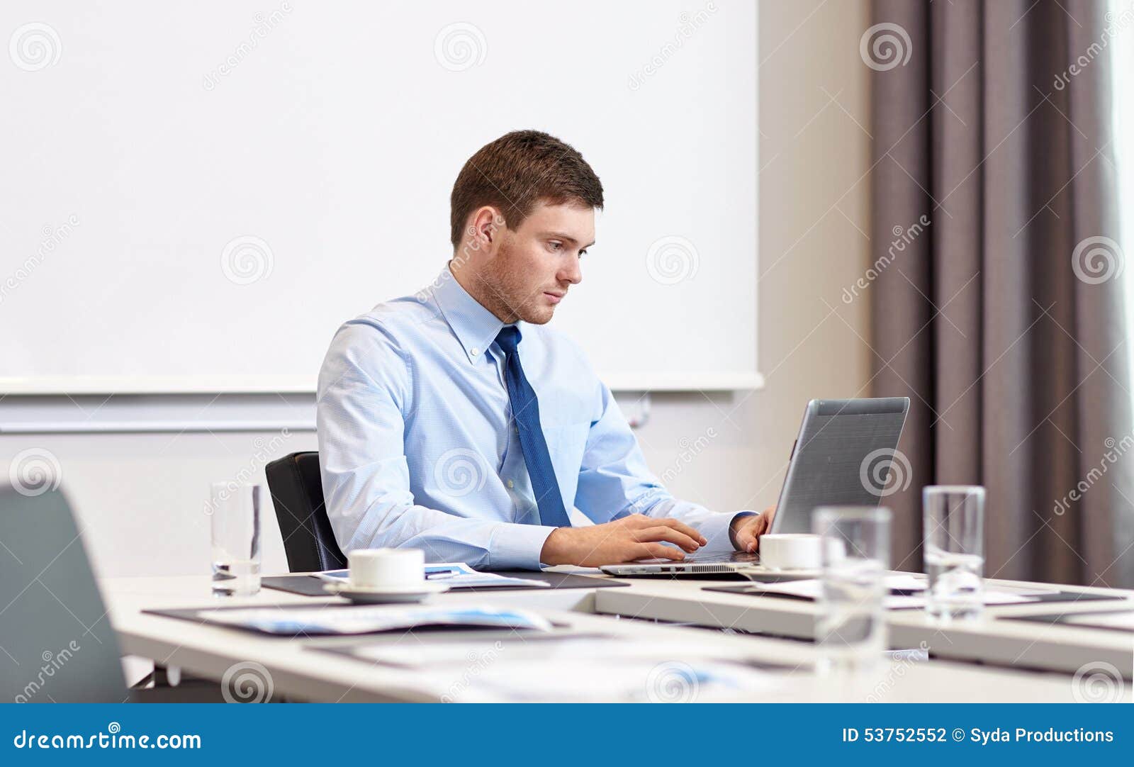 Businessman with Laptop Working in Office Stock Photo - Image of male ...