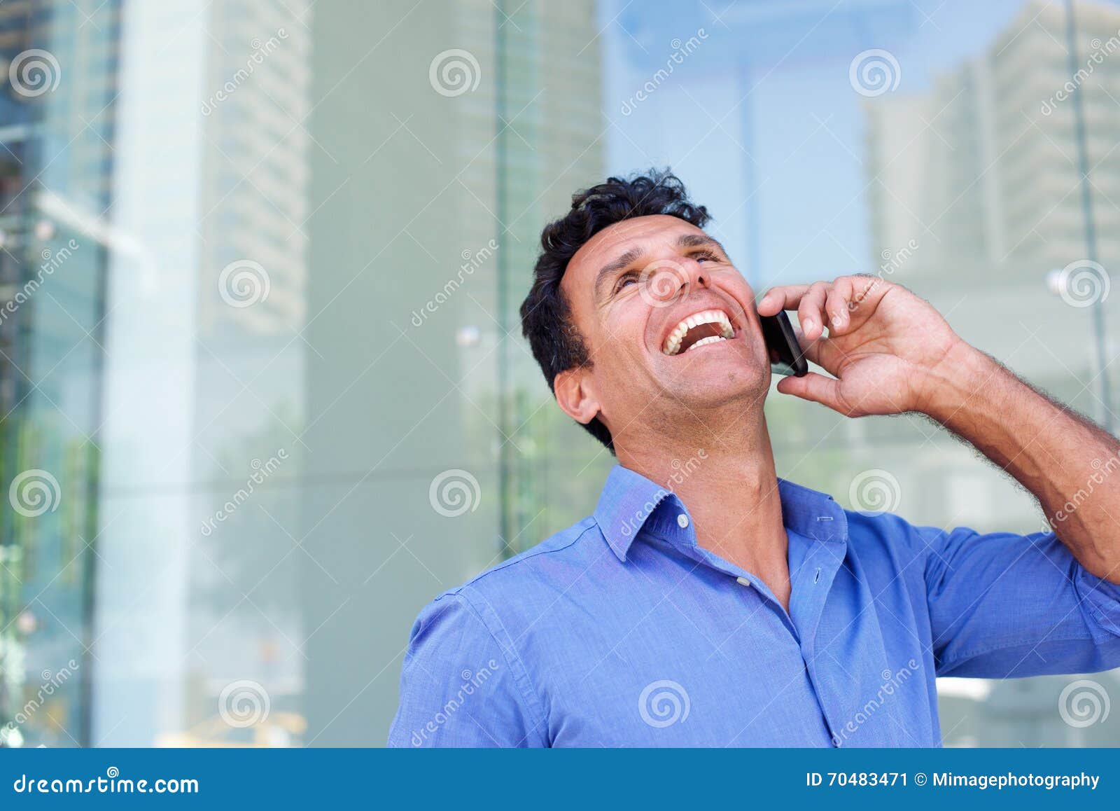 Businessman Laughing with Cell Phone Stock Image - Image of laughing ...