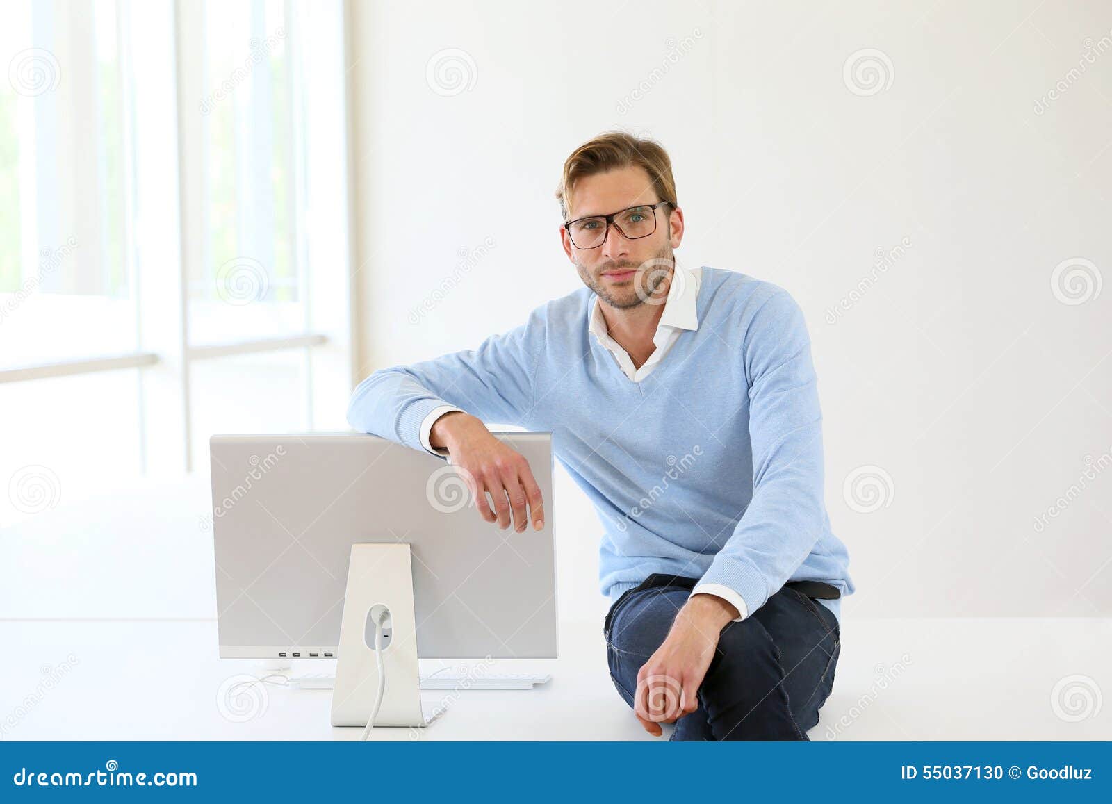 Businessman Leaning on Computer Stock Photo - Image of classroom ...