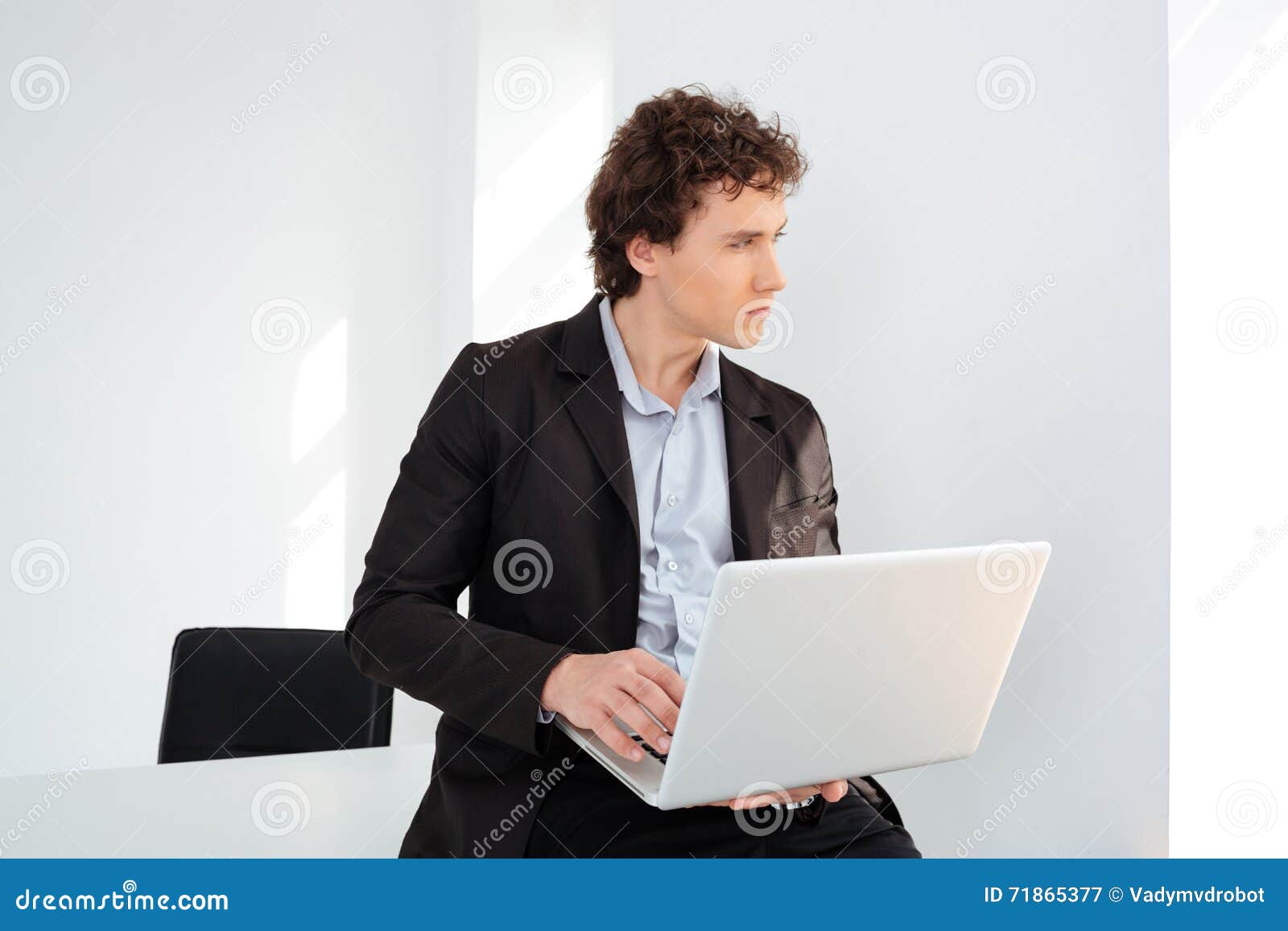 Businessman Leaning on the Table with Laptop Computer Stock Image ...