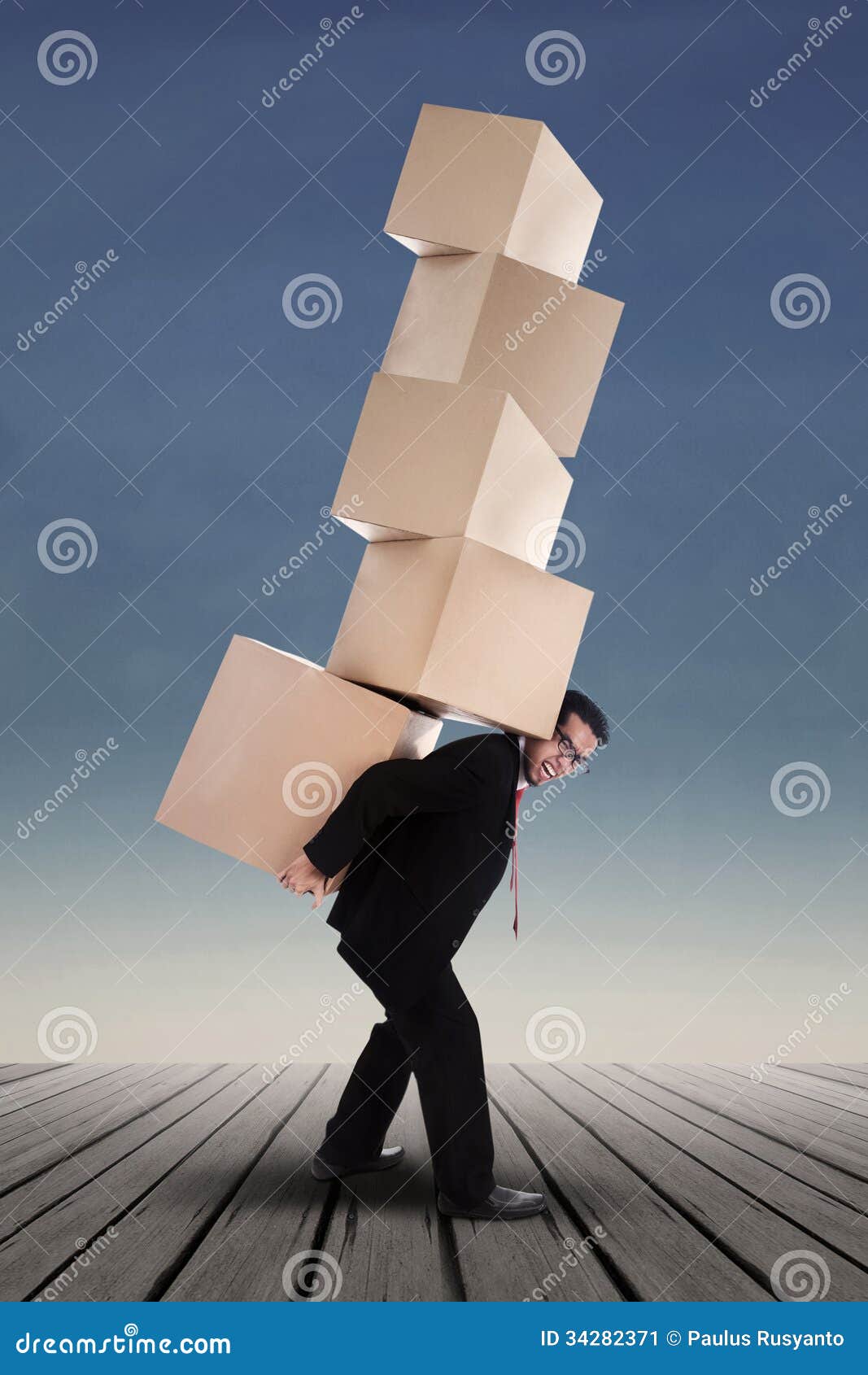 Businessman Lifting Boxes Vertical Stock Image - Image of indian ...