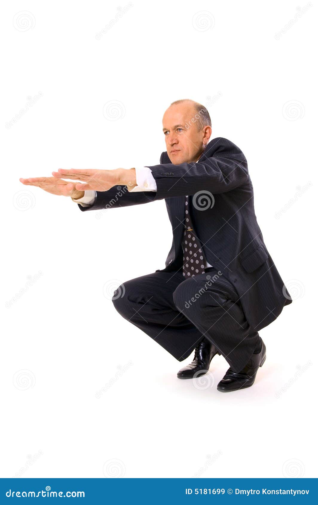 Businessman limbering up stock image. Image of occupation - 5181699