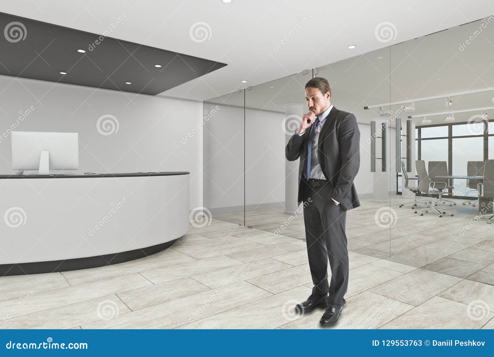Businessman in lobby stock image. Image of modern, attractive - 129553763