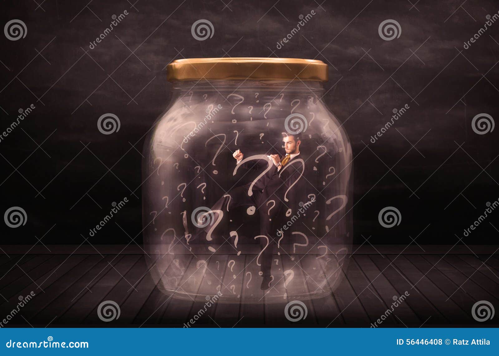 Businessman Locked into a Jar with Question Marks Concept Stock Photo ...
