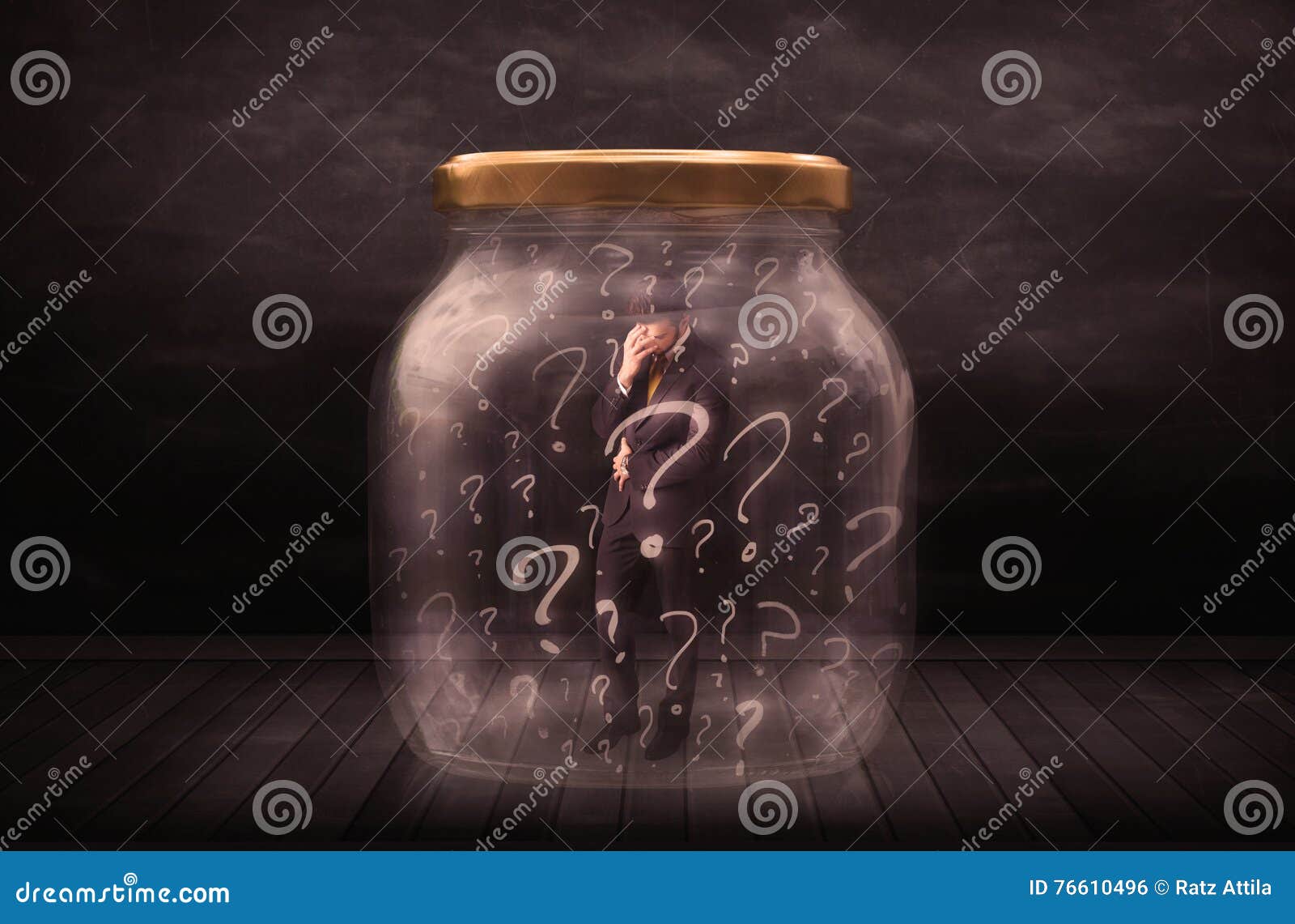 Businessman Locked into a Jar with Question Marks Concept Stock Photo ...