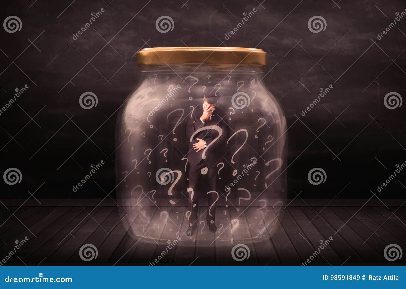 Businessman Locked into a Jar with Question Marks Concept Stock Image ...