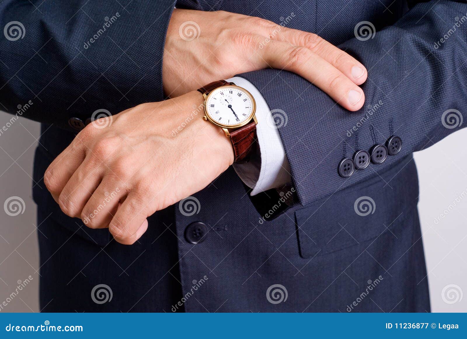 Businessman look his watch stock image. Image of professional - 11236877