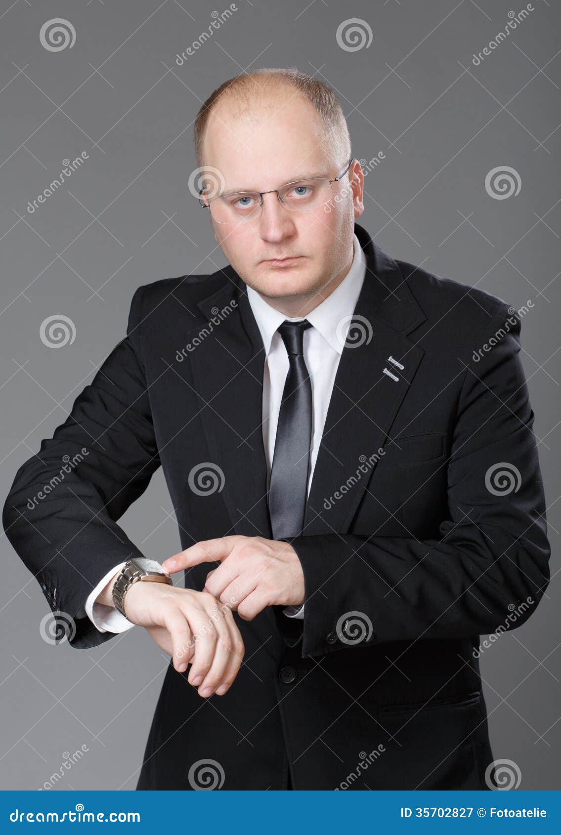 Businessman look his watch stock image. Image of appointment - 35702827