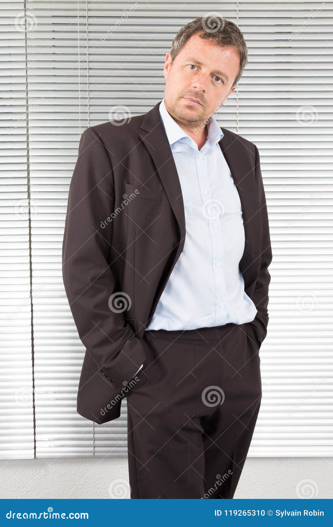 A Businessman Looking at Camera with Proud Expression Stock Photo ...
