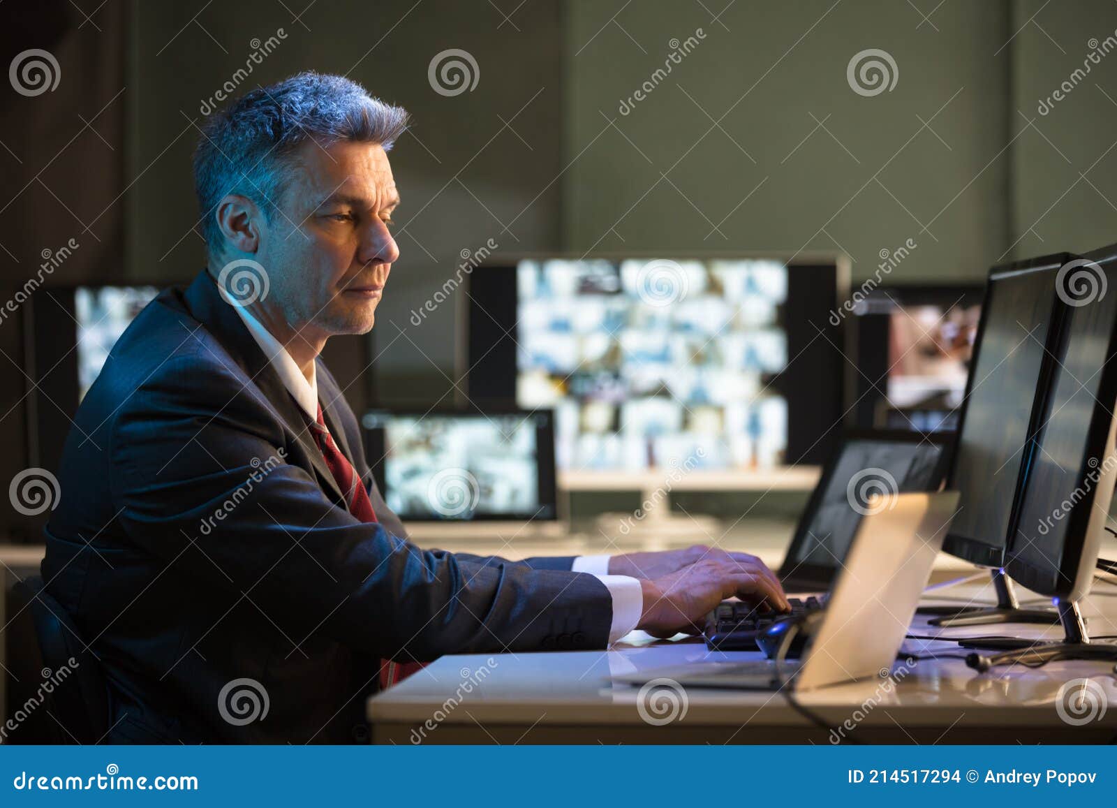 Businessman Looking at CCTV Camera Footage Stock Photo - Image of ...