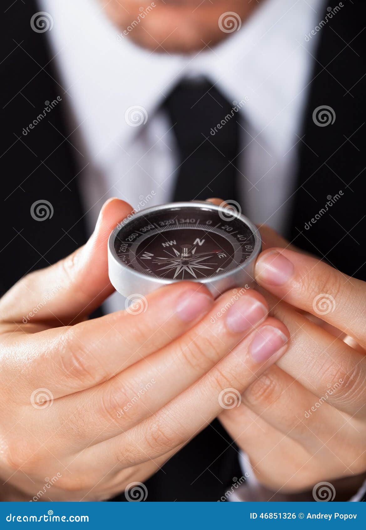 Businessman Looking at a Compass Stock Photo - Image of nature ...