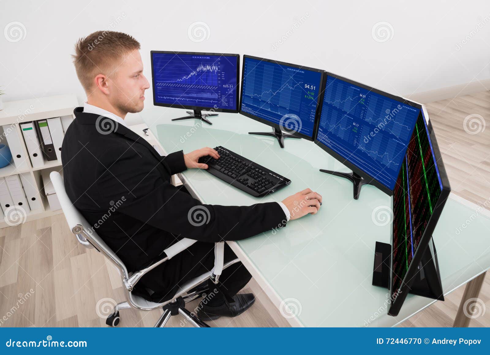 Businessman Looking at Graph on Computer Screen Stock Photo - Image of ...