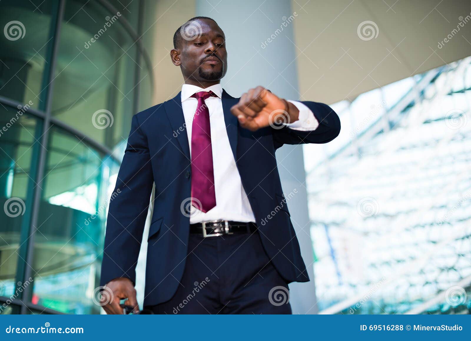 Businessman Looking at His Watch Stock Photo - Image of businessman ...