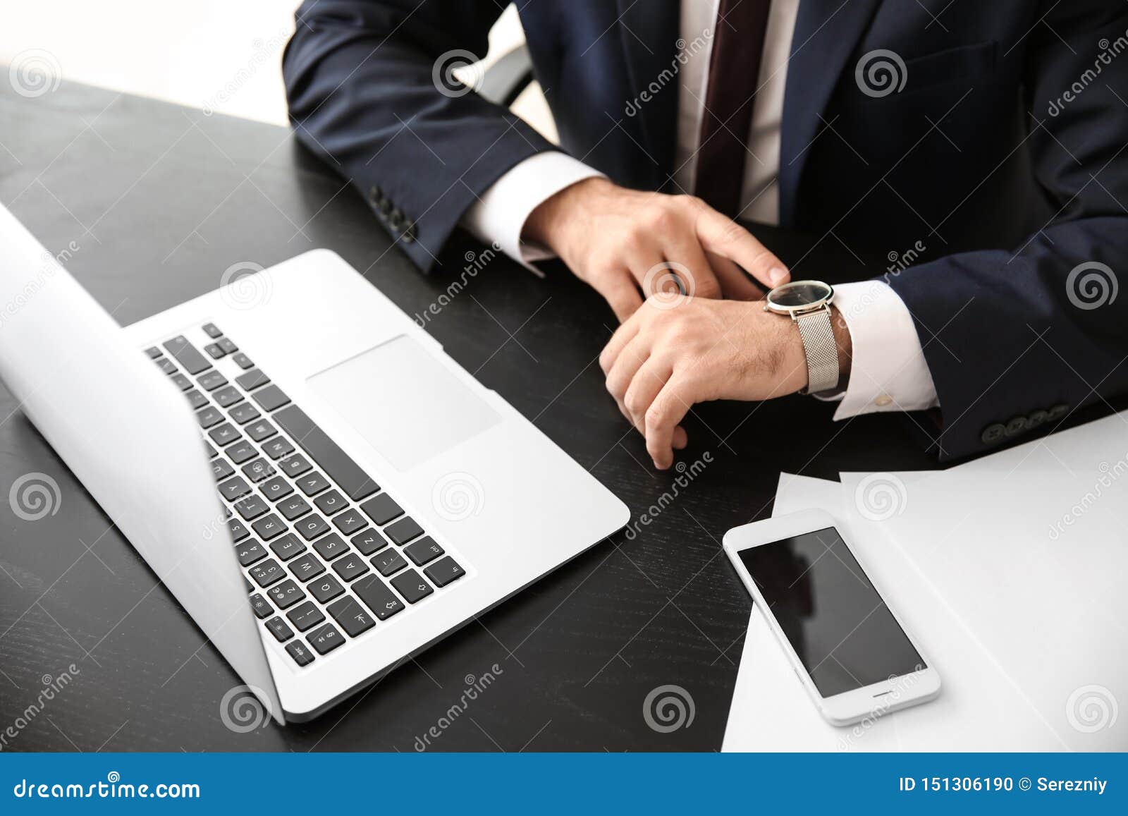 Businessman Looking at His Watch in Office Stock Photo - Image of male ...