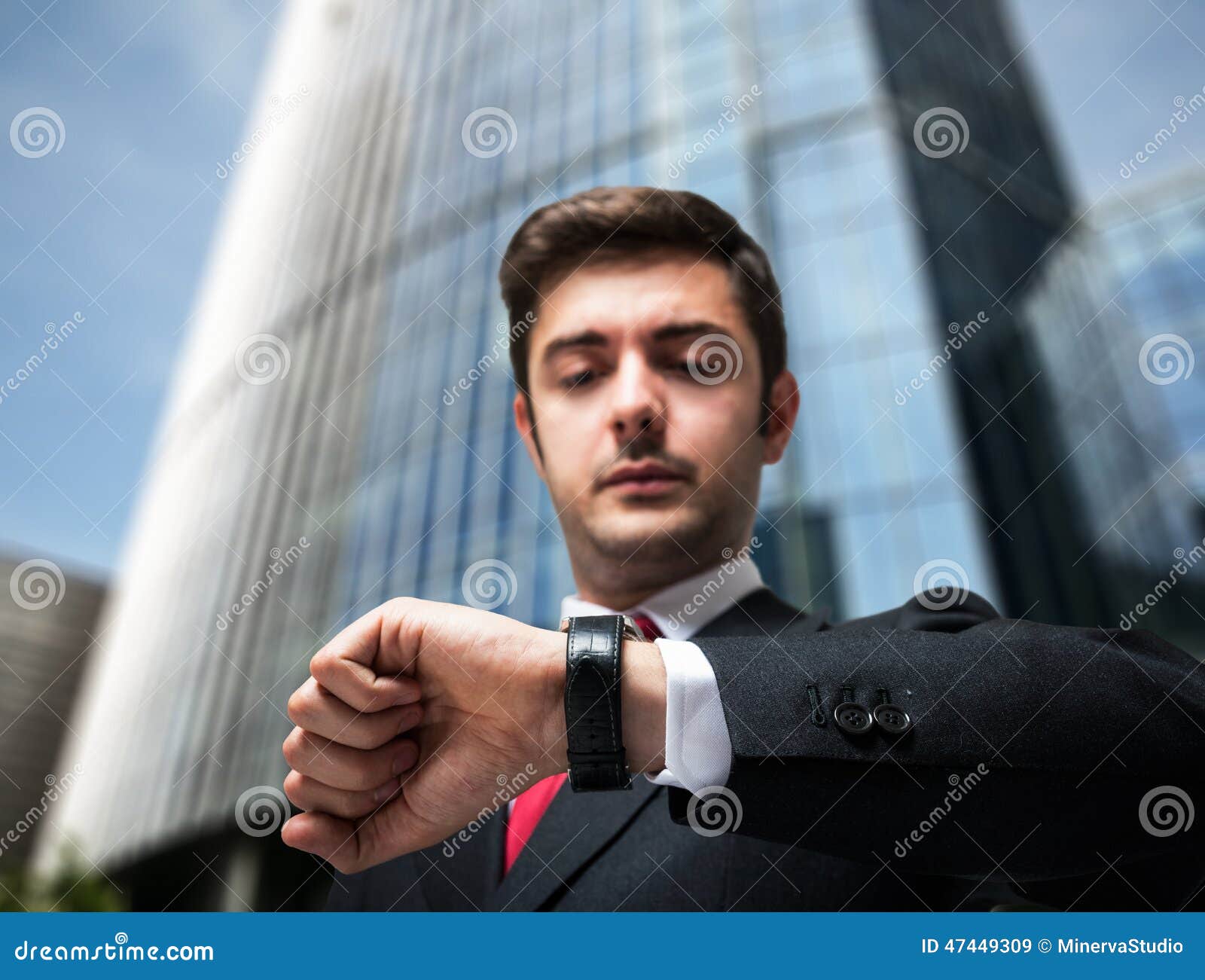 Businessman Looking at His Watch Stock Image - Image of successful ...