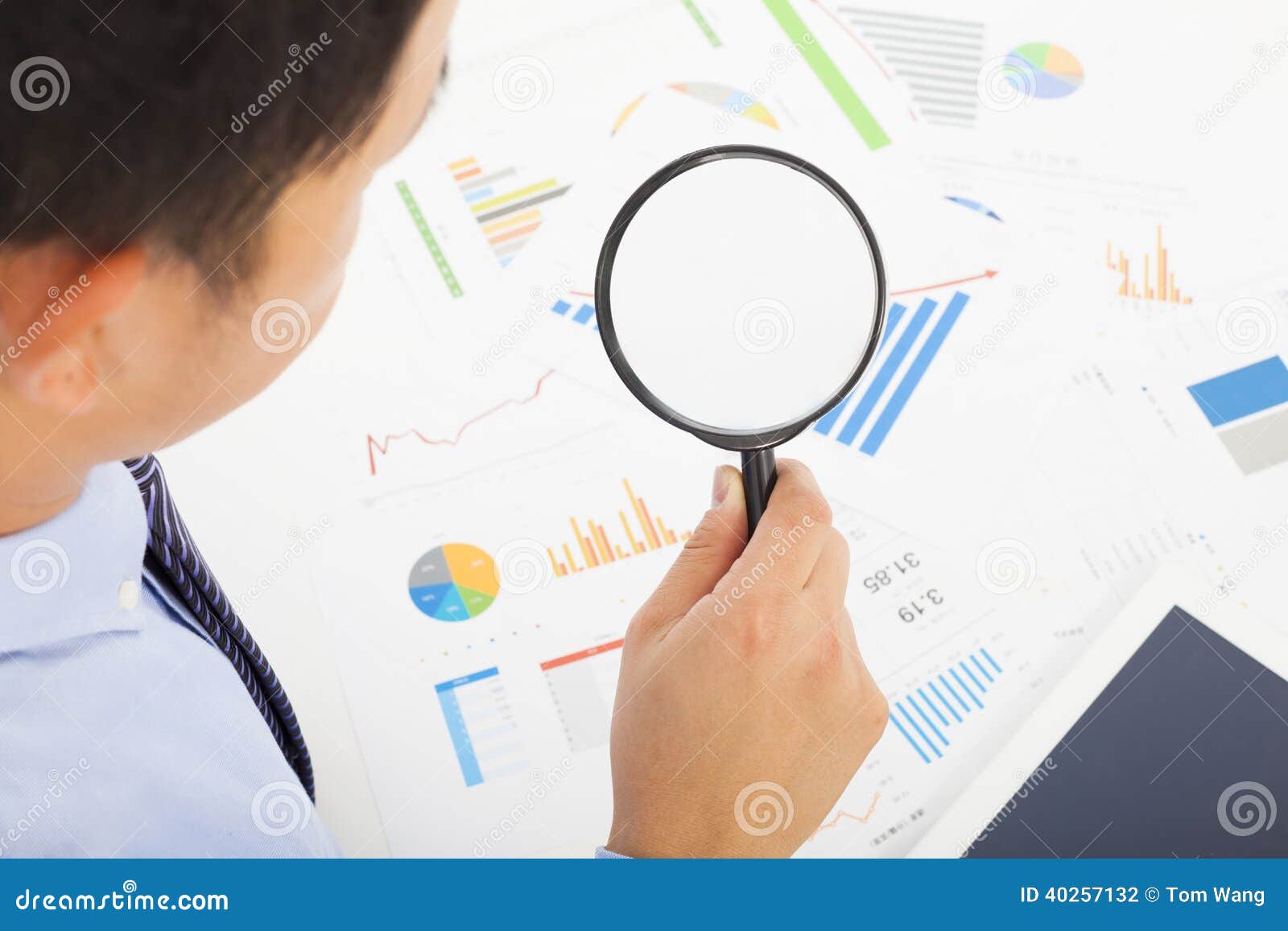 Businessman Looking through Magnifier Glass To Documents Stock Photo ...