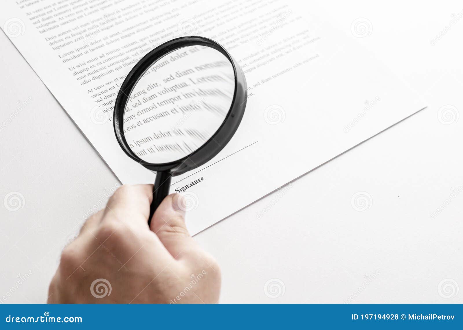 Businessman Looking through a Magnifying Glass To Documents Stock Photo ...