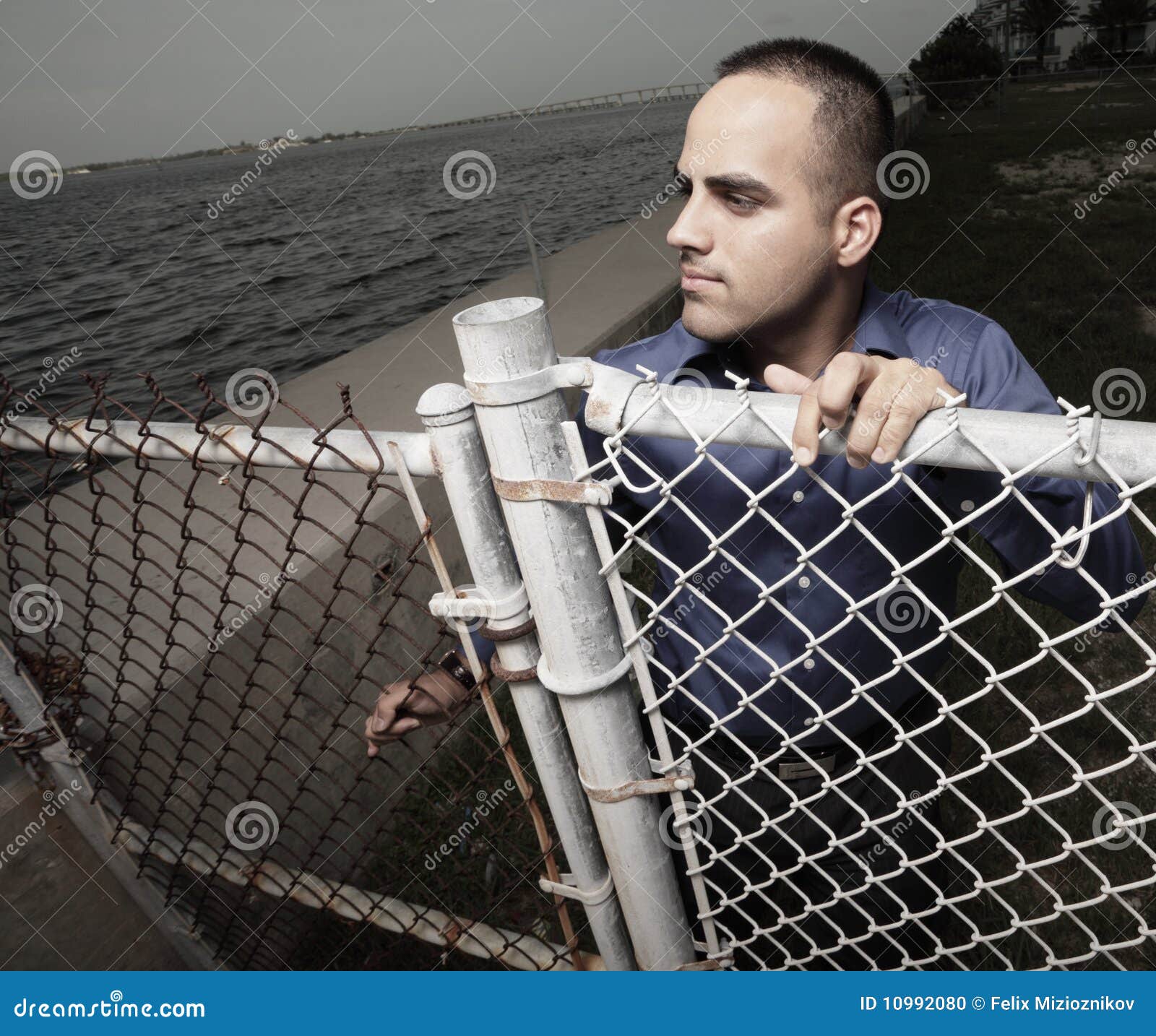 Businessman Looking Over a Fence Stock Photo - Image of hispanic, head ...