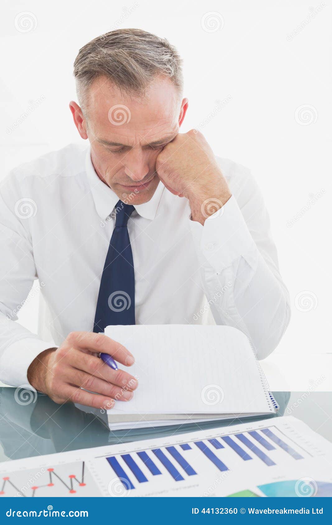 Businessman Looking Over His Notes Stock Photo - Image of away, male ...