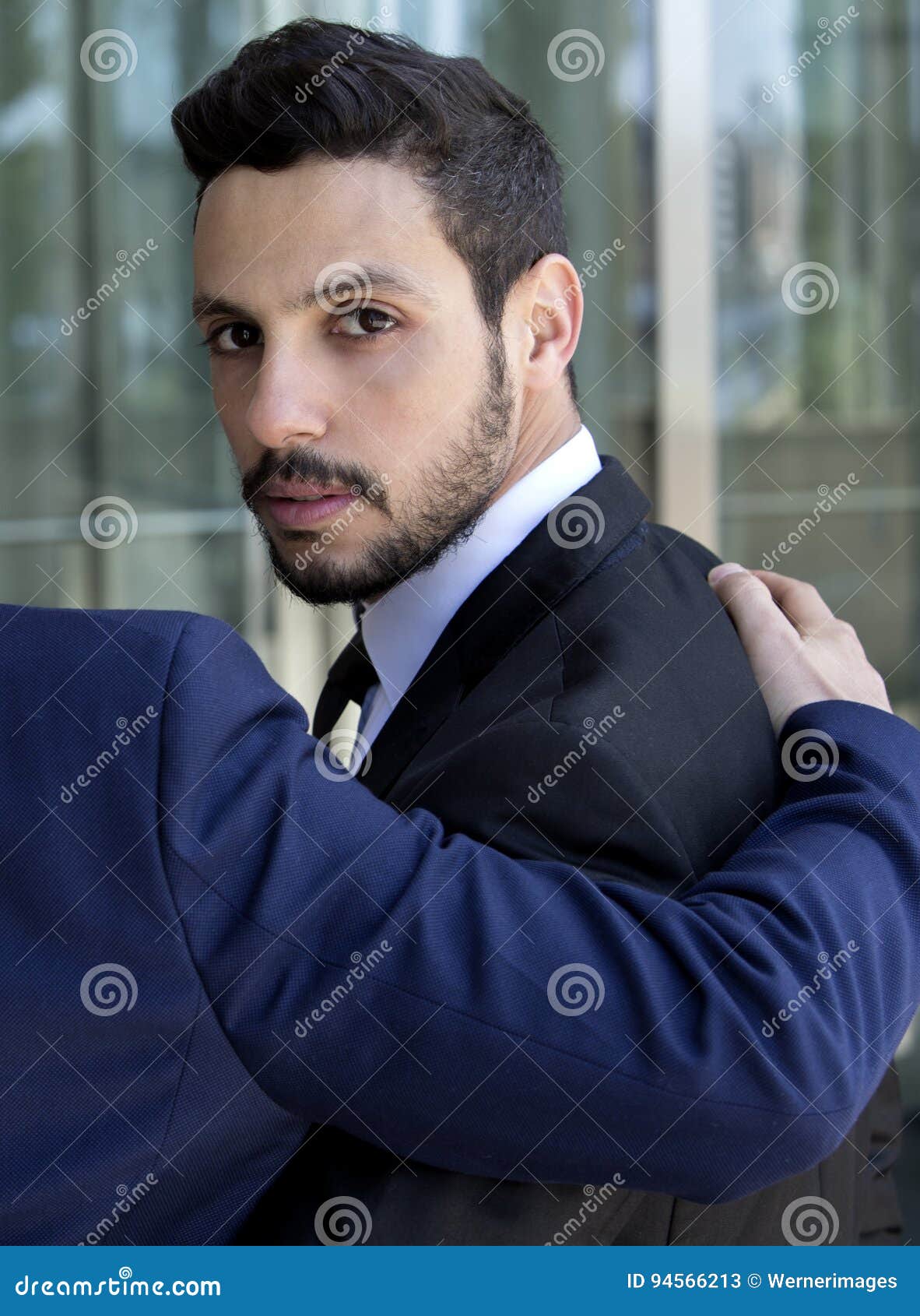 Businessman Looking Over His Shoulder at Camera Stock Image - Image of ...