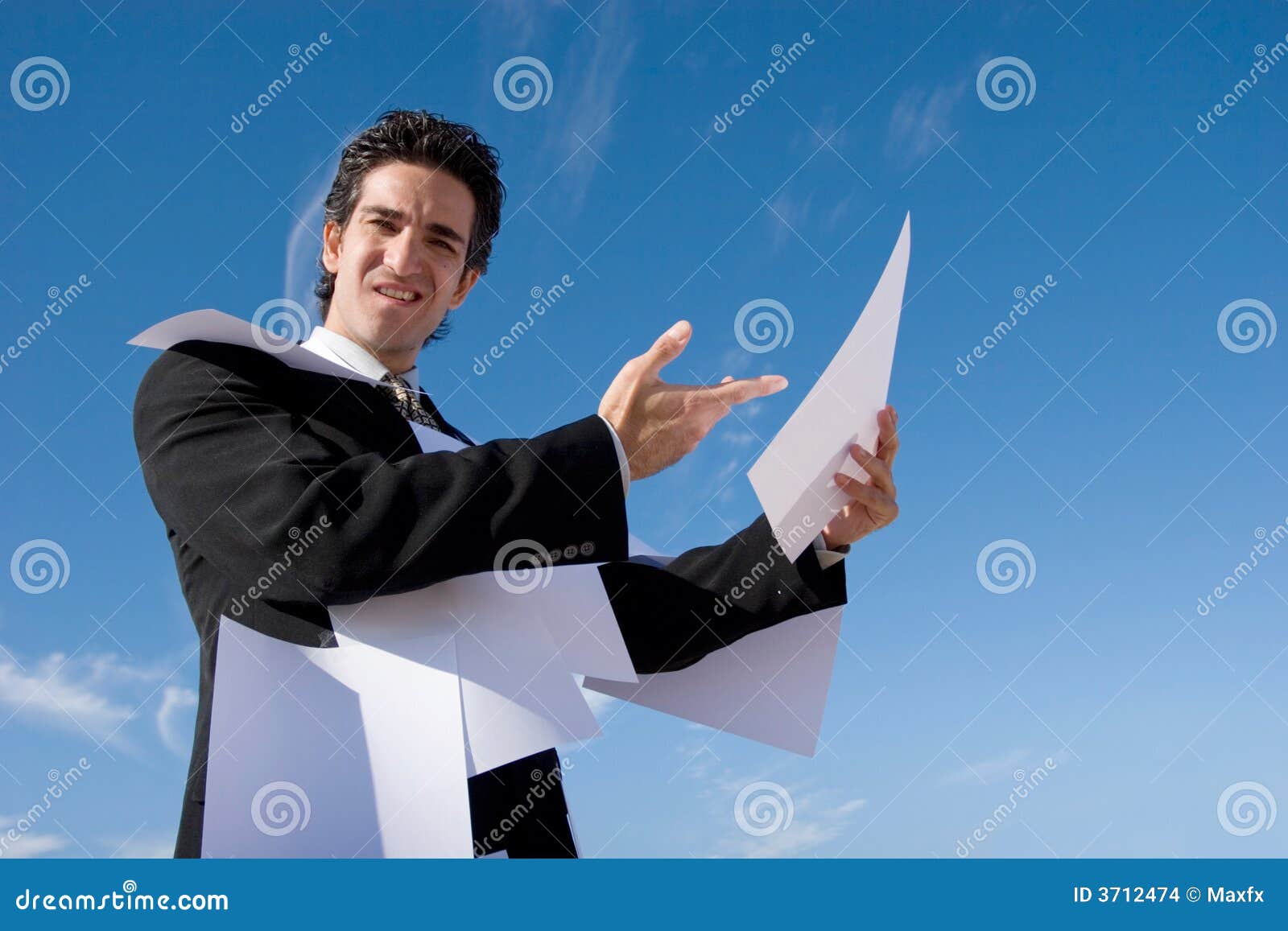 Businessman Looking Over Paperwork Stock Photo - Image of paperwork ...