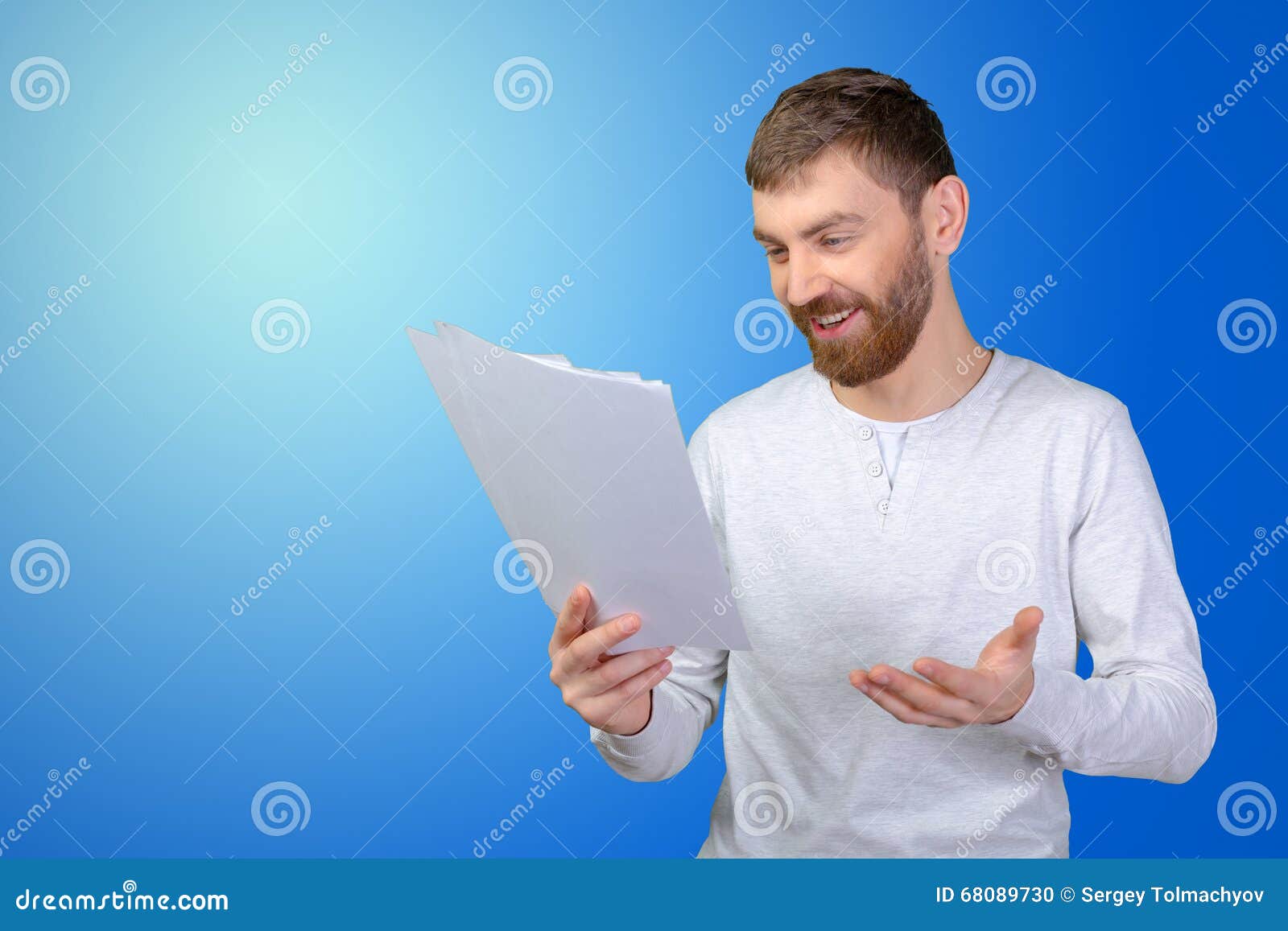 Businessman Looking through Papers Stock Photo - Image of male, looking ...