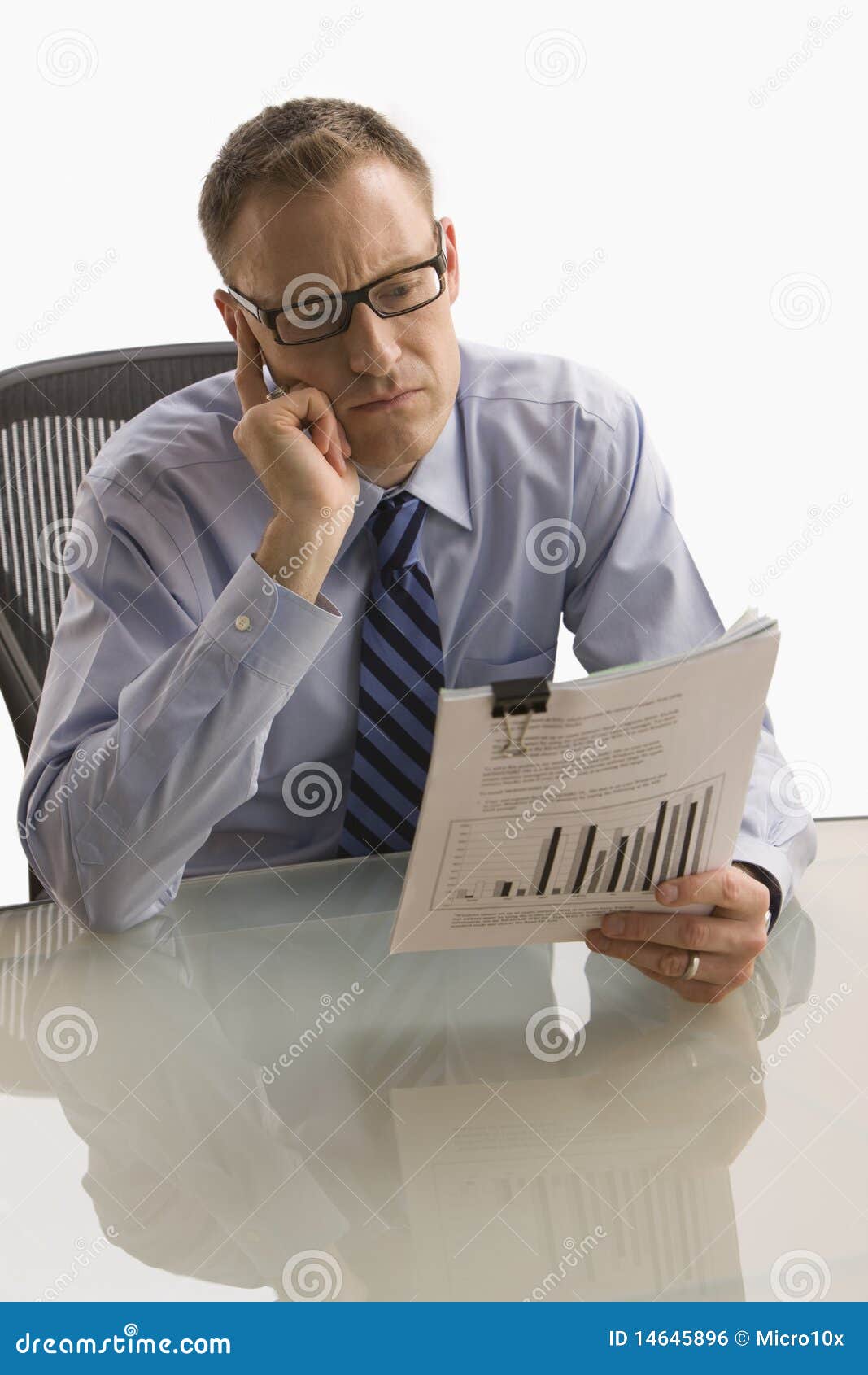 Businessman Looking at Paperwork - Isolated Stock Photo - Image of male ...