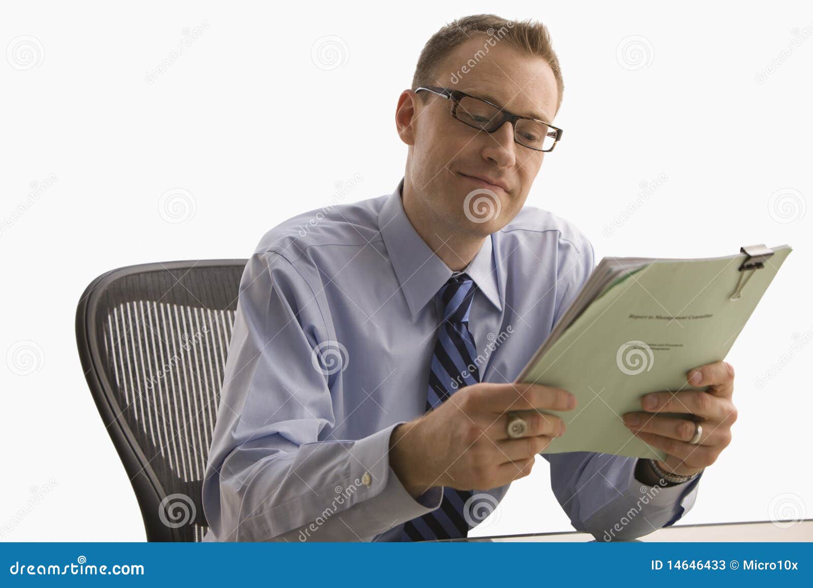Businessman Looking at Paperwork - Isolated Stock Image - Image of ...