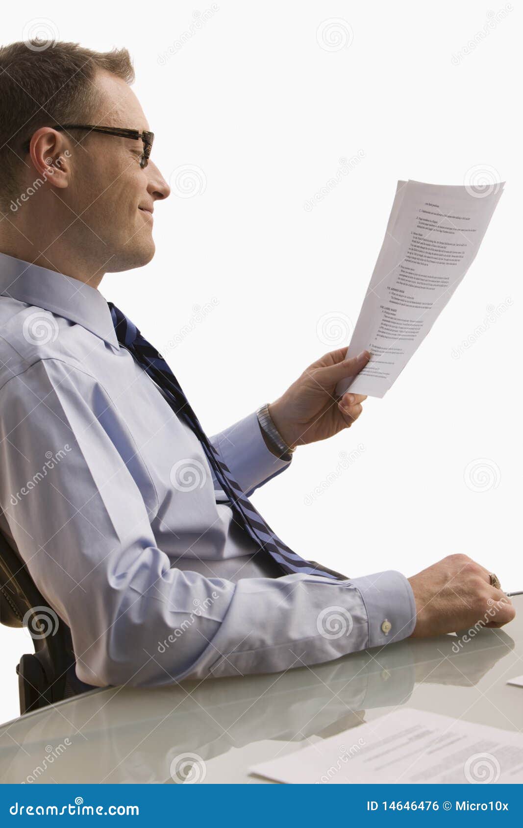 Businessman Looking at Paperwork - Isolated Stock Photo - Image of ...