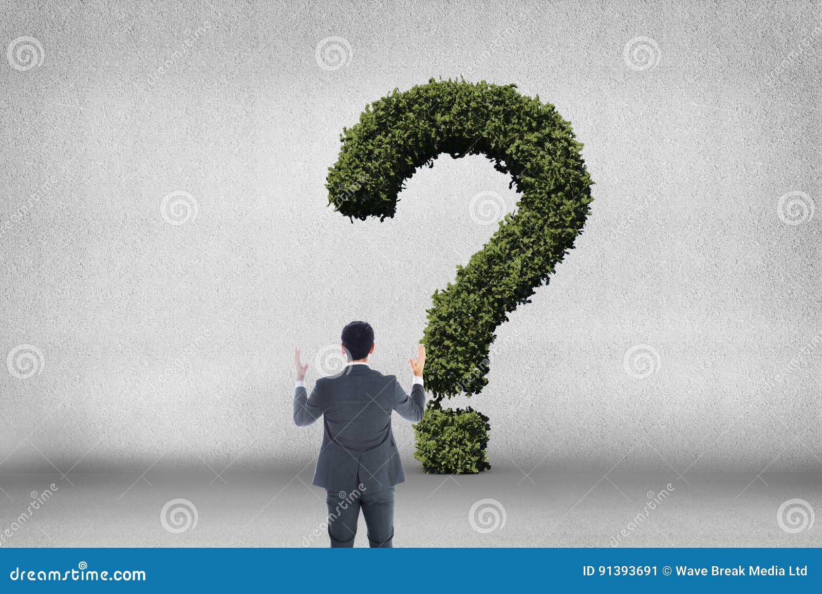 Businessman Looking at Question Mark Made of Bushes Stock Image - Image ...
