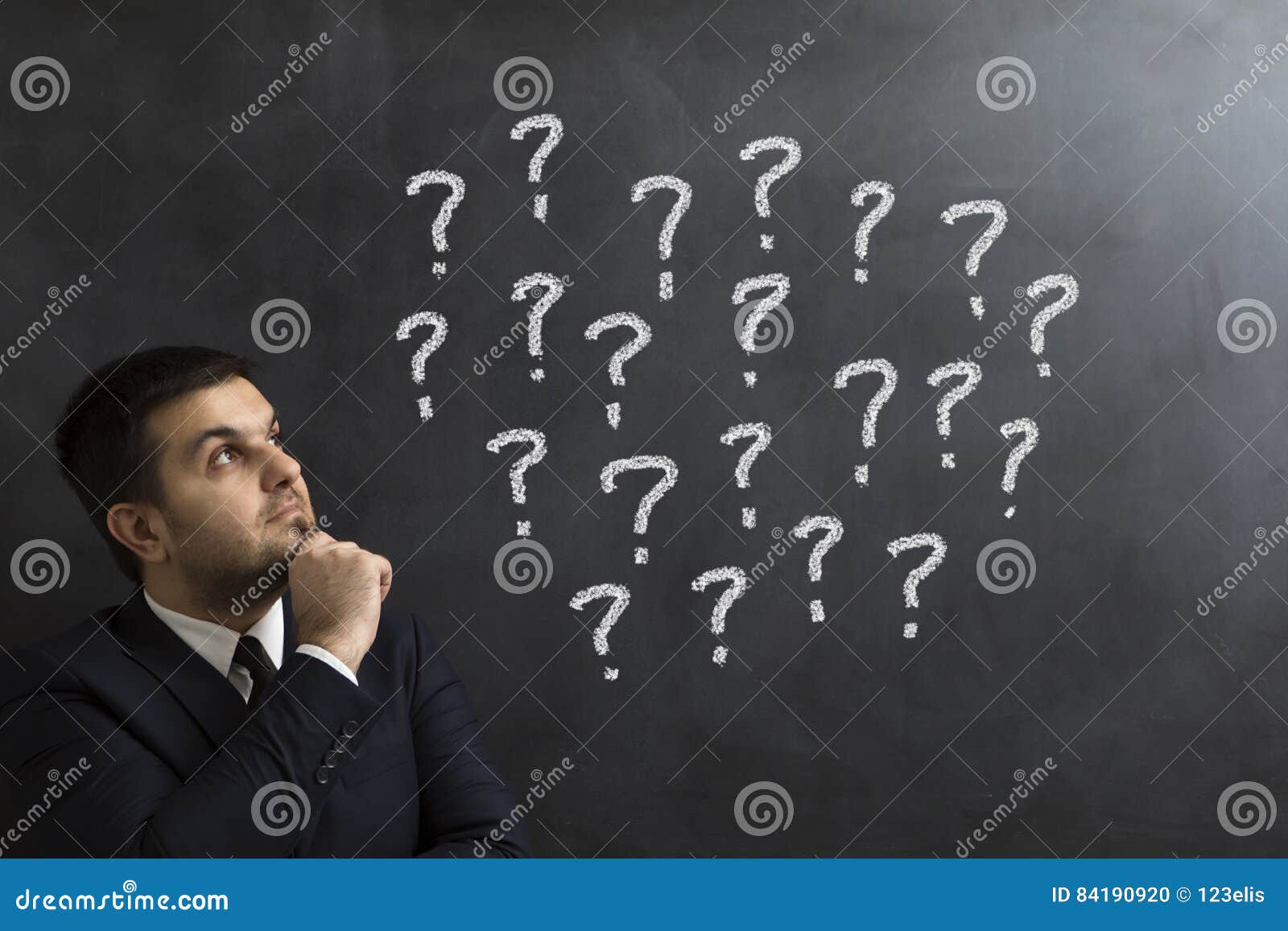 Businessman Looking Question Marks on the Blackboard Stock Photo ...