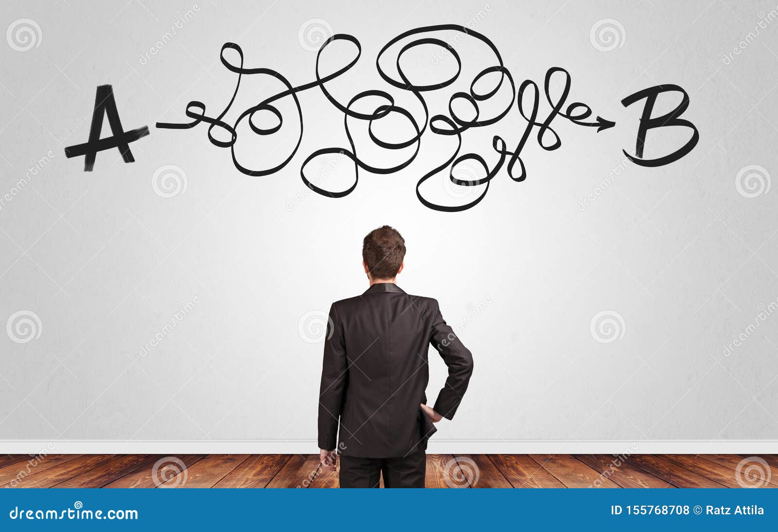 Businessman Looking for Solution while Standing in Front of a Wall ...