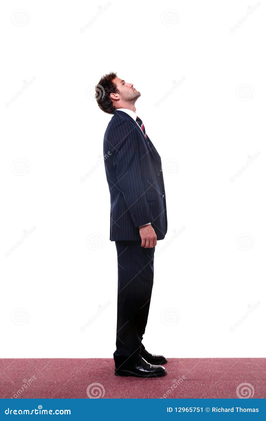 Businessman looking up stock image. Image of thoughful - 12965751