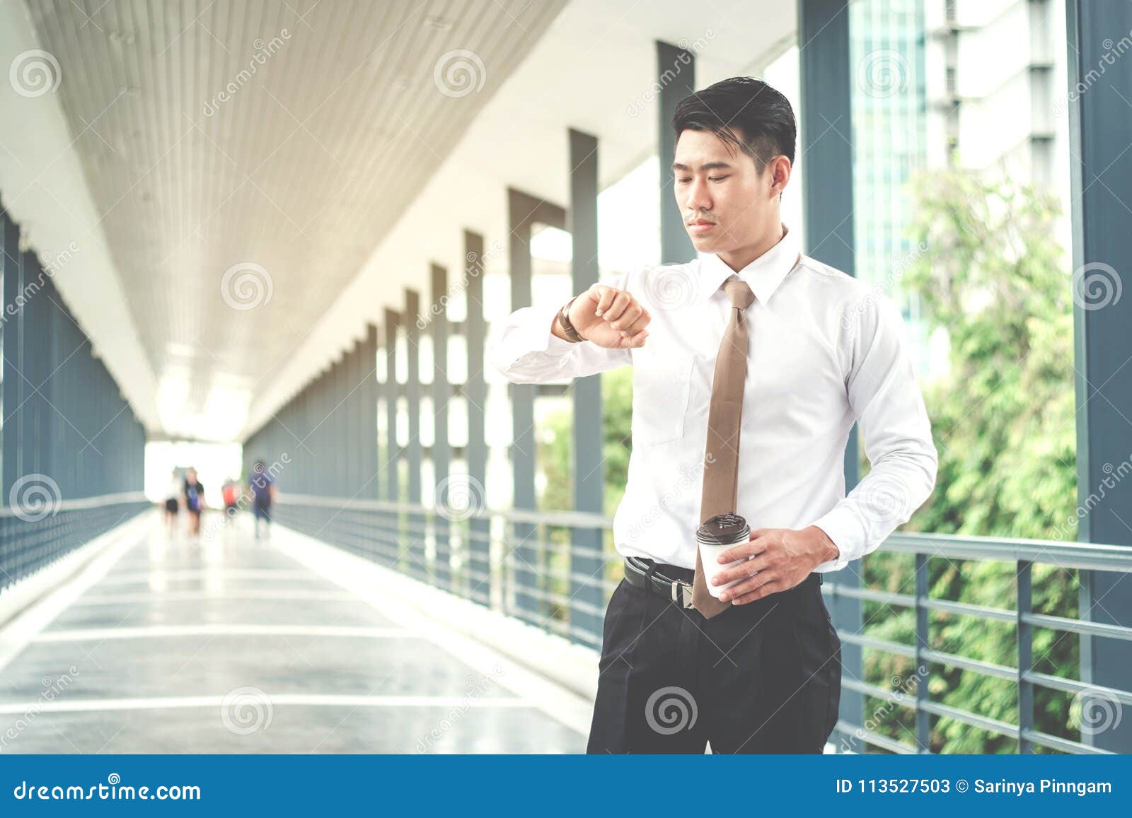 Businessman Looking at Watch he Looks on the Time Stock Image - Image ...