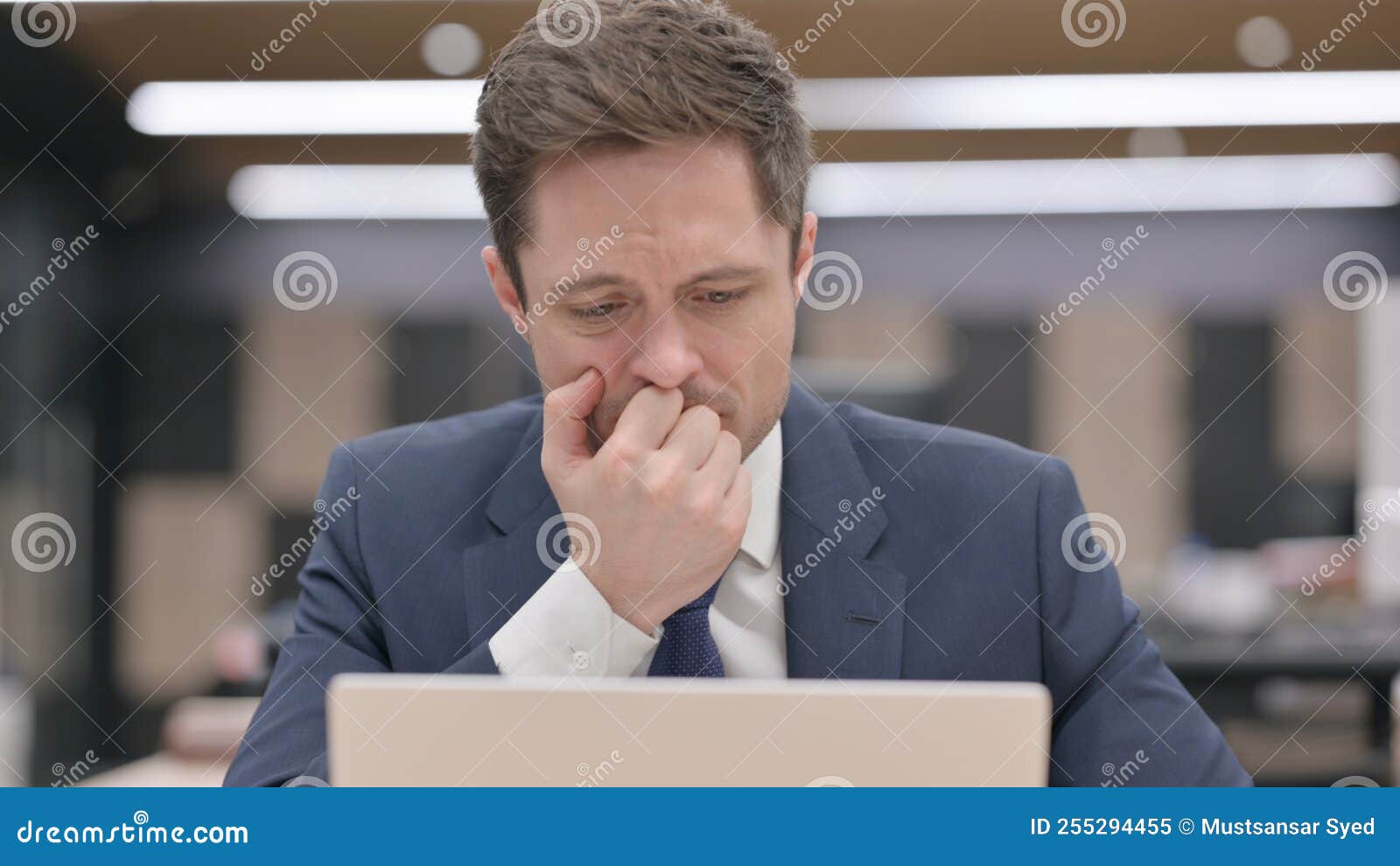 Businessman with Loss Using Laptop at Work Stock Image - Image of ...
