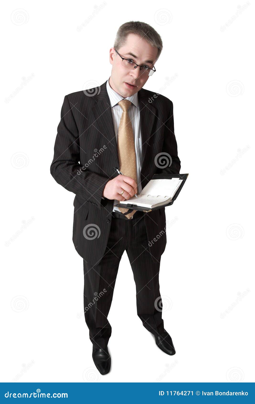 Businessman Makes Entry in Notebook Stock Image - Image of businessman ...