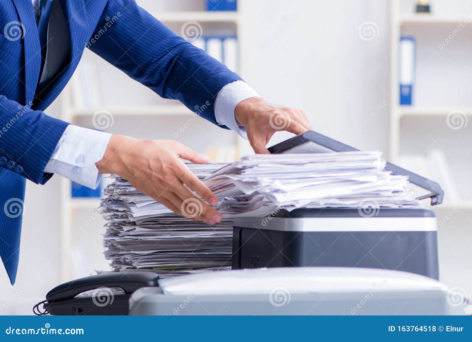 Businessman Making Copies in Copying Machine Stock Photo - Image of ...