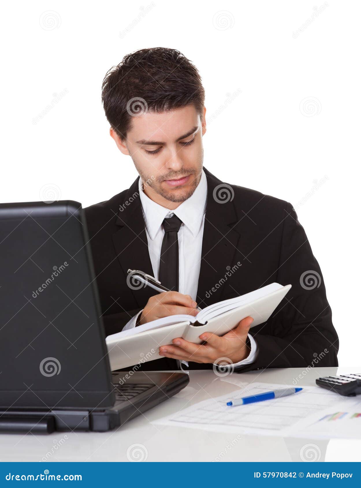 Businessman Making a Note in His Diary Stock Photo - Image of ...